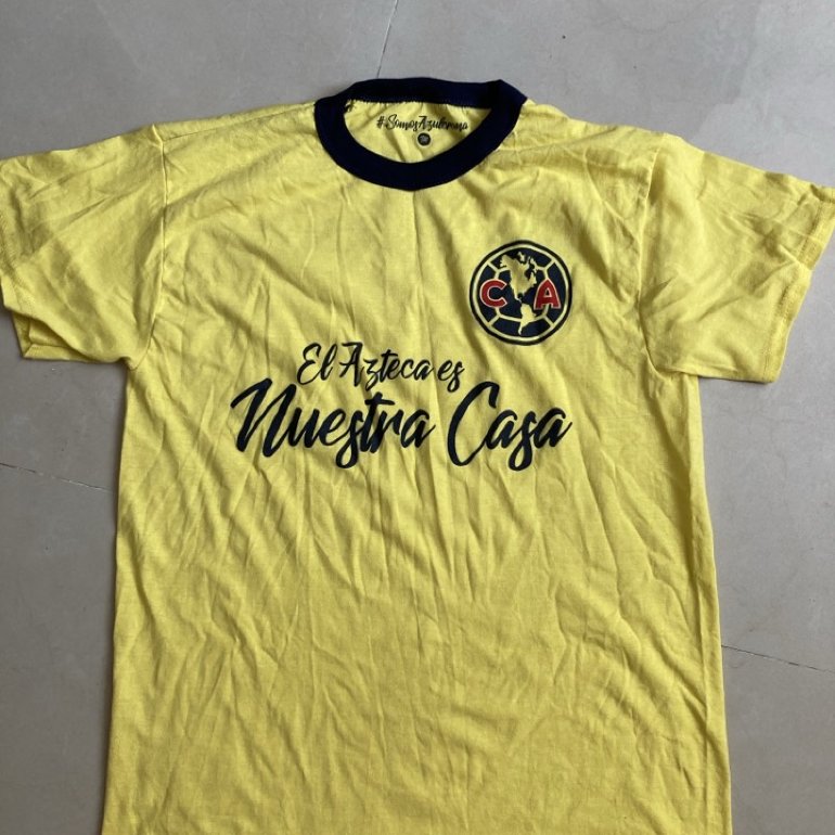 America playera amarilla de segunda mano - GoTrendier