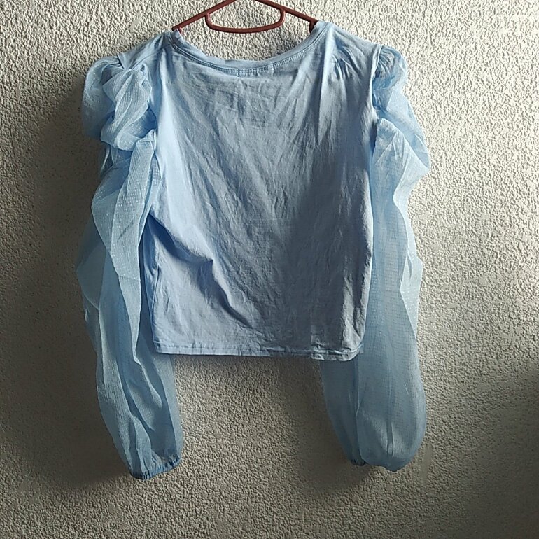 Blusa azul bebé con mangas y lentejuelas de Otras marcas de segunda ...