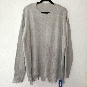 Suéter oversized estilo roto de Romwe de segunda mano - GoTrendier