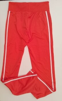 Panta color naranja con franjas blancas de Otras marcas de segunda mano ...